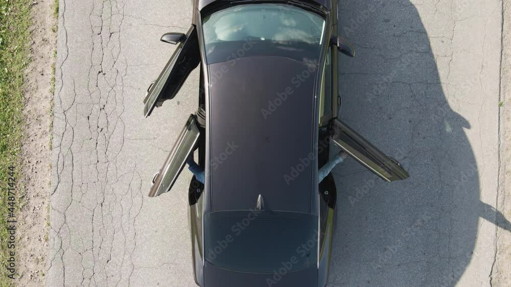 Three doors of a passenger car open wide, top view. Bird's-eye view of ...