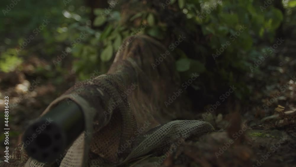 Video Stock Close-up of sniper rifle suppressor during military mission ...