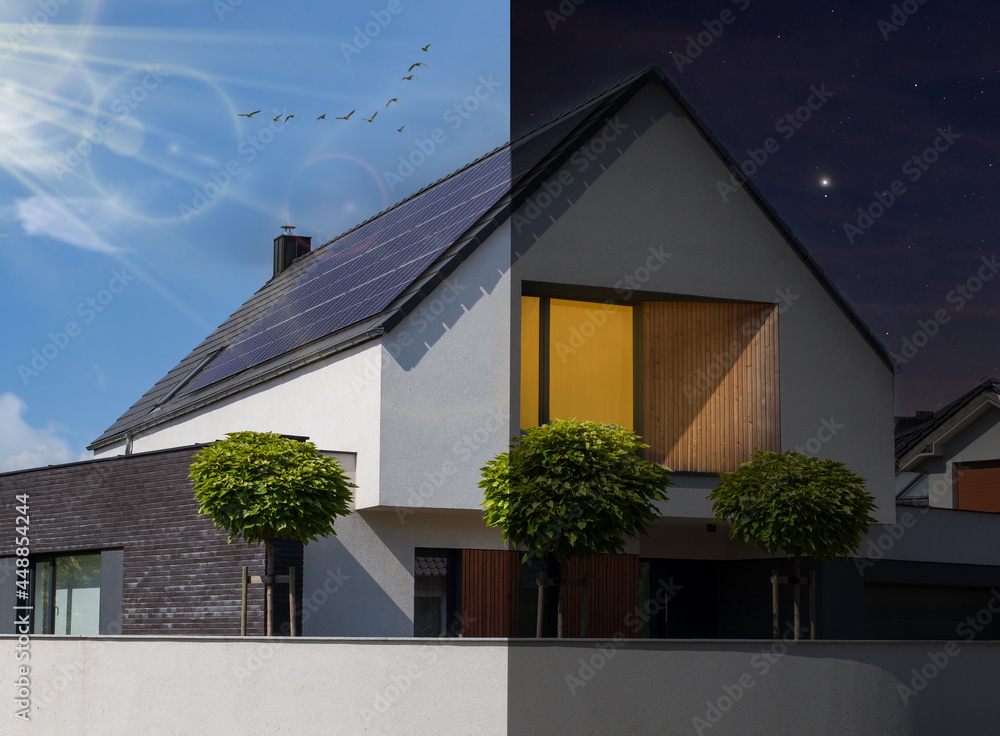 Solar panels on the roof. Beautiful modern house day and night. Ecology ...