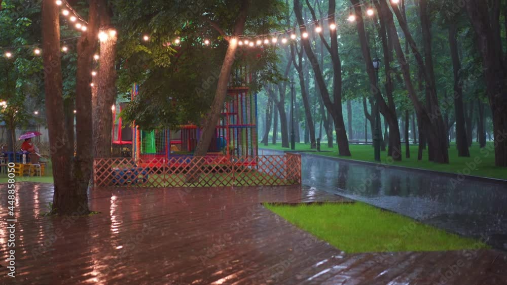 Children Play On Playground Rainy Day In City Public Park Rain Water ...