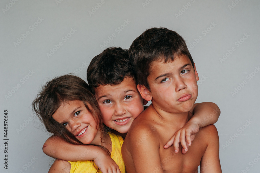 Funny portrait of three siblings. Stock Photo | Adobe Stock