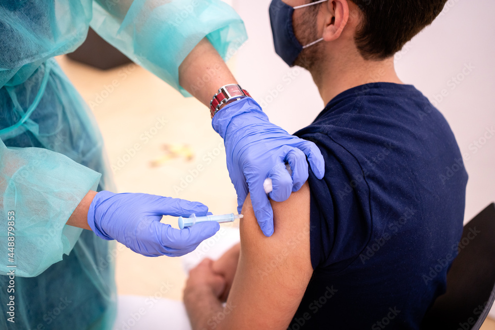 COVID-19 Vaccination. Stock Photo | Adobe Stock