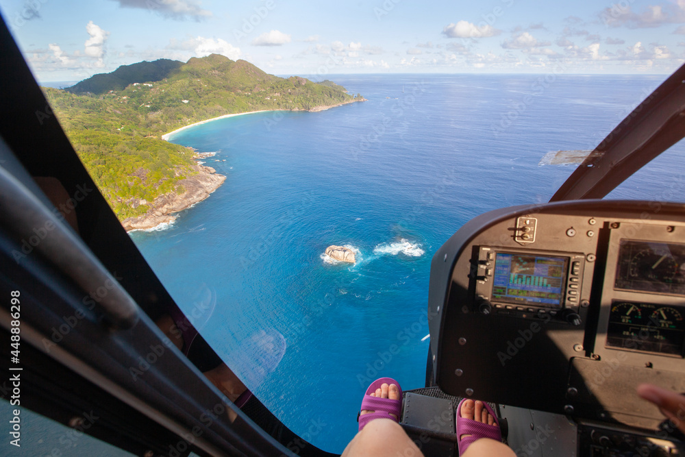 passenger's feet in helicopter during the flight Stock Photo | Adobe Stock