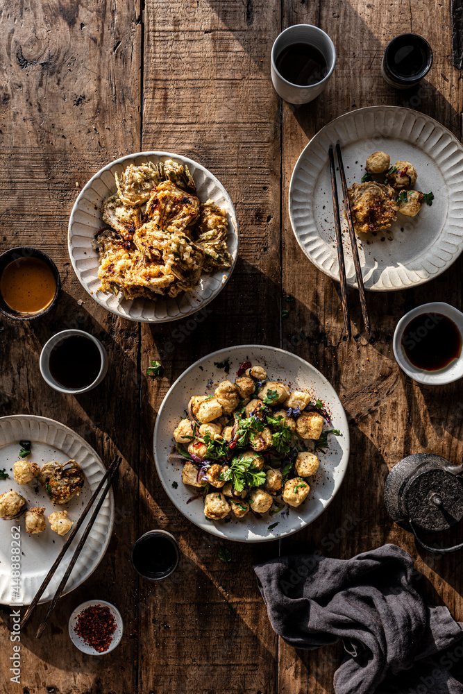 Asian food table : Fried Tofu with tempura artichokes Stock Photo ...
