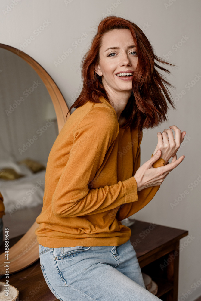 Pretty woman posing at home Stock Photo | Adobe Stock