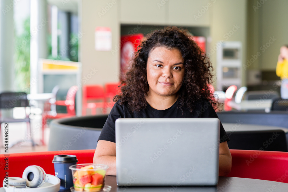 aboriginal woman using computer Stock Photo | Adobe Stock