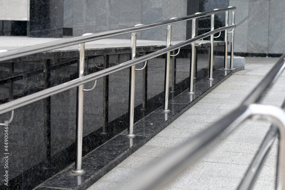 Close up of the metal railings at the entrance to the office building ...