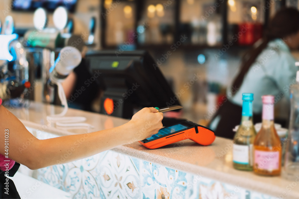 Contactless payment from card via pos terminal Stock Photo | Adobe Stock