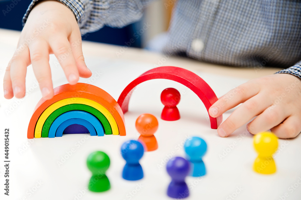 Wooden colorful rainbow. Toy for children fun and creativity. Sequence ...