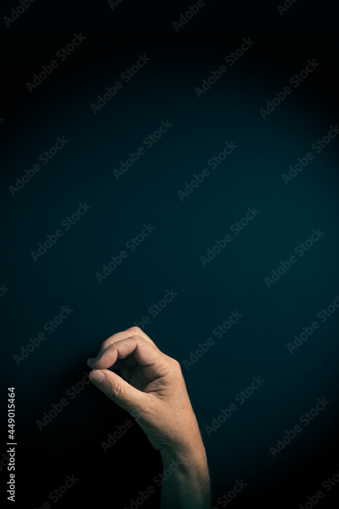 Colour image of hand demonstrating ASL sign language letter O with ...
