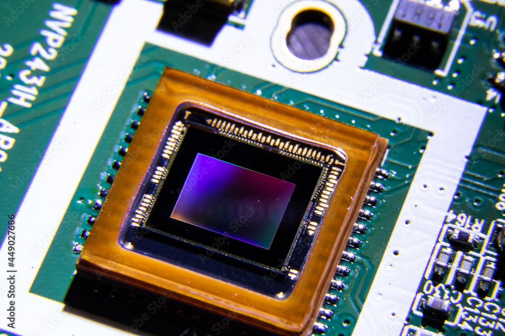 Smartphone CMOS camera sensor reflecting light causing colorful ...