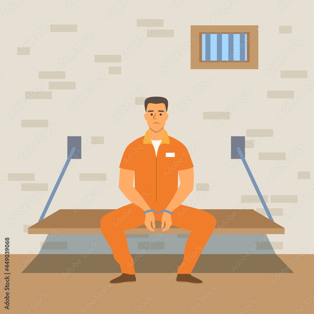 Prisoner in orange jumpsuit is sitting in his cell. His hands are ...