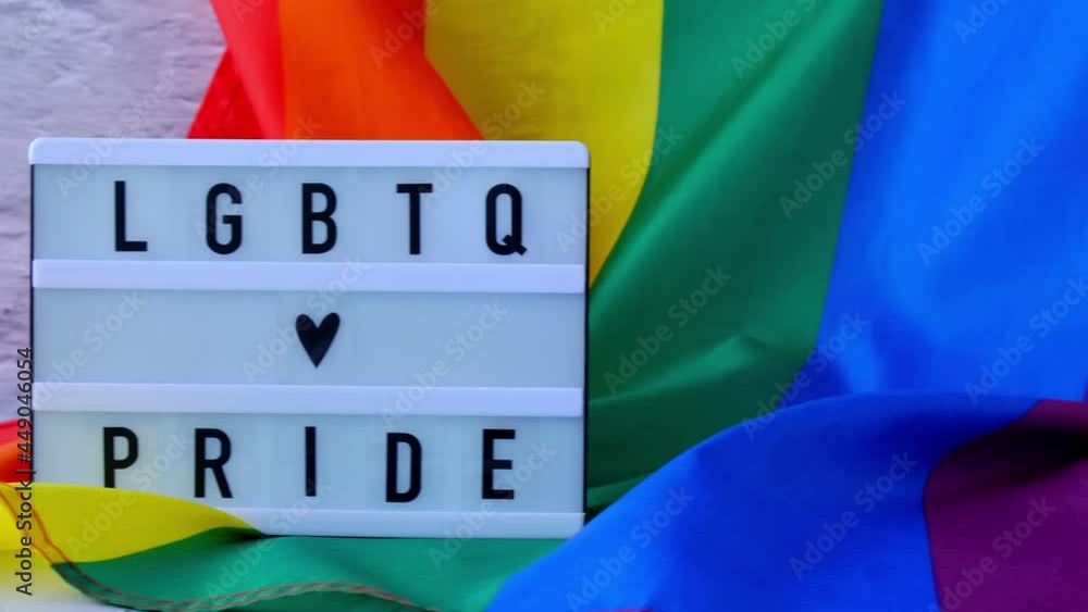 Rainbow flag with lightbox and text LGBTQ PRIDE. Rainbow lgbtq flag ...
