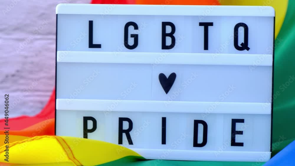 Rainbow flag with lightbox and text LGBTQ PRIDE. Rainbow lgbtq flag ...