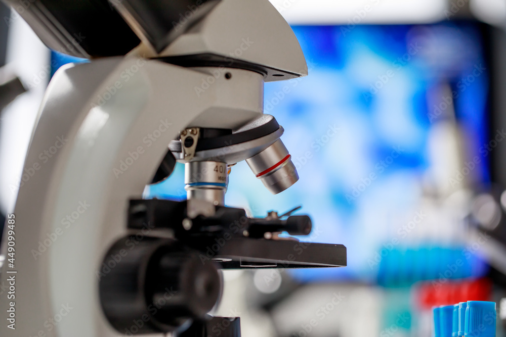 Modern scientific microscope with selective lens objectives for various ...