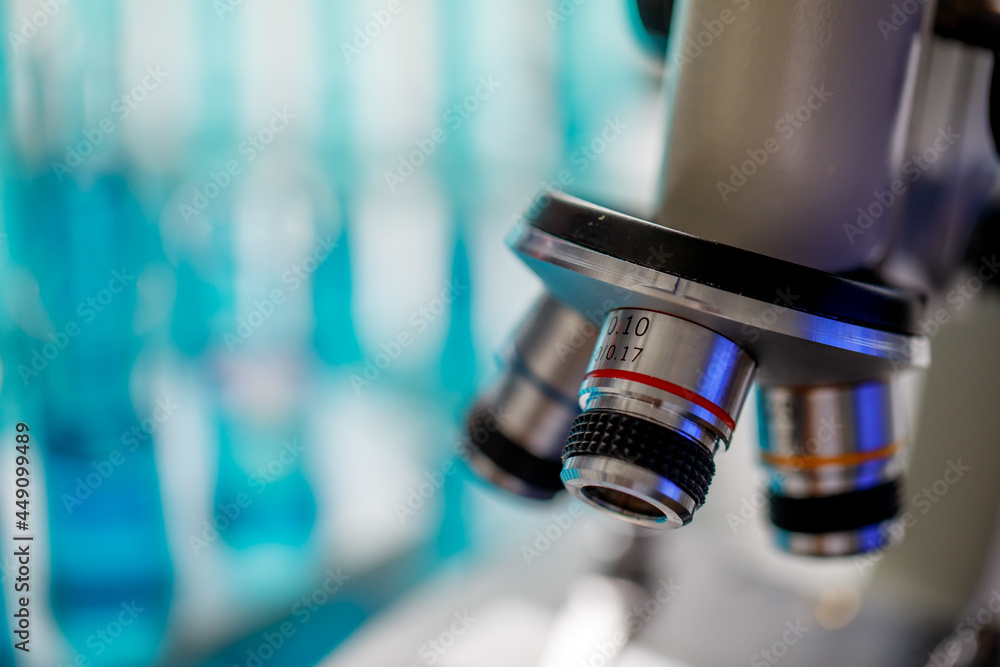 Modern scientific microscope with selective lens objectives for various ...