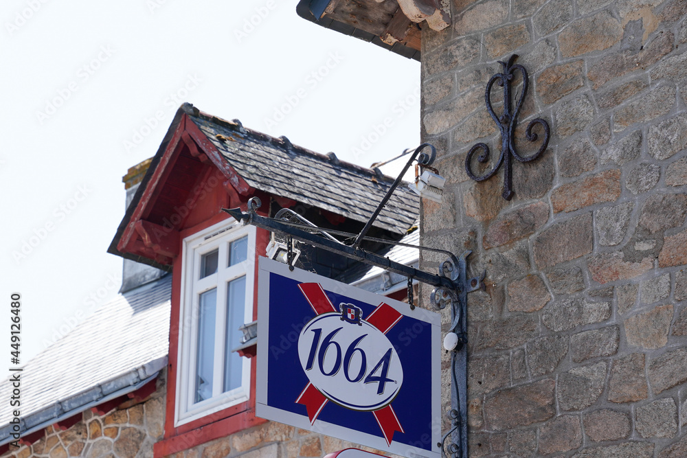 1664 beer brand logo and sign text on wall pub restaurant facade Stock ...