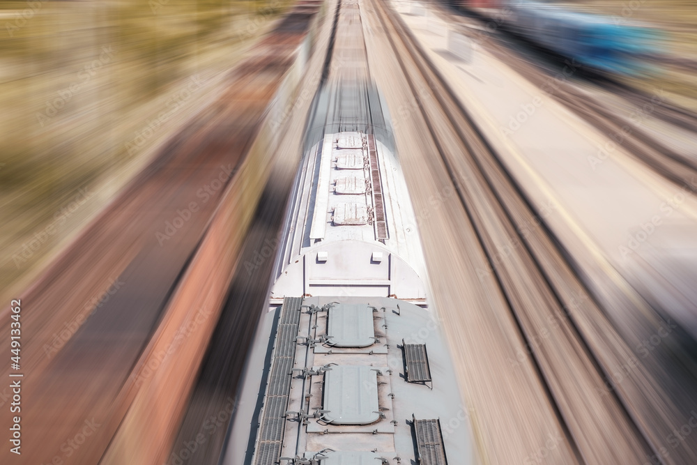Freight train in motion at the station. Train with blur effect on the ...