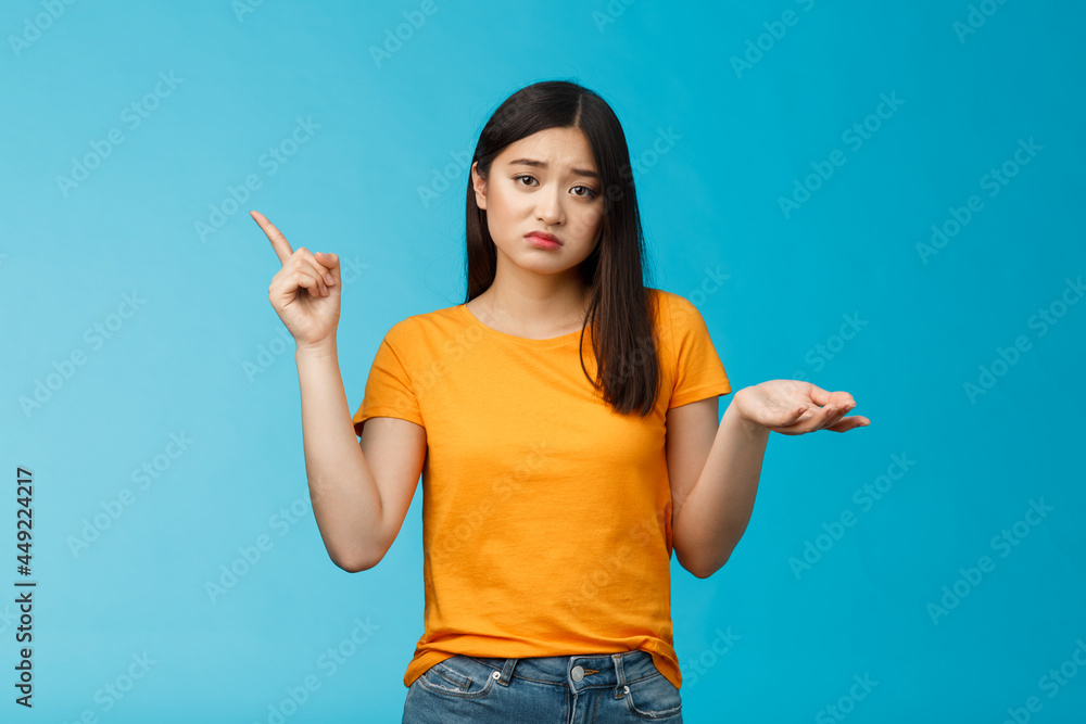Troubled cute upset asian girl have problem asking your help, pointing ...