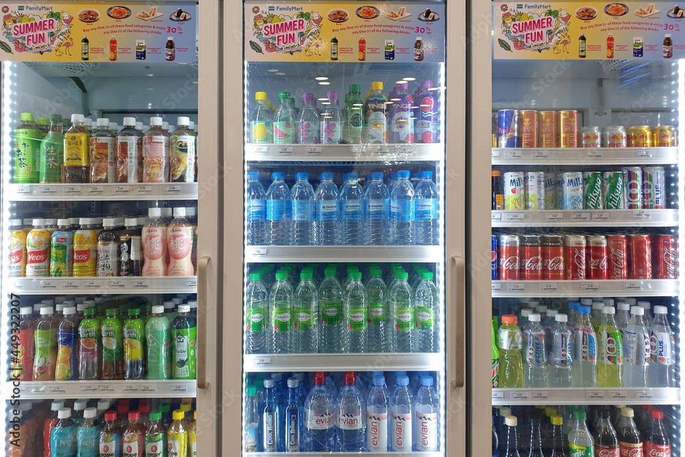 Stockfoto View of huge glass fridge with various choice beverages in ...