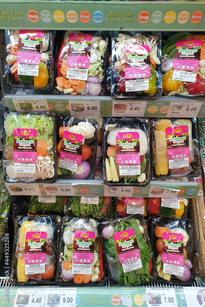 Huge open refrigerator with various ready pack fresh vegetables in Aeon ...