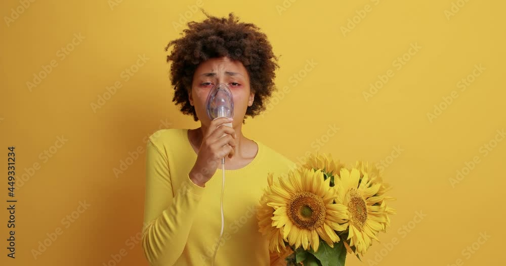 Difficult to beath. Unhappy curly African American woman suffers from ...