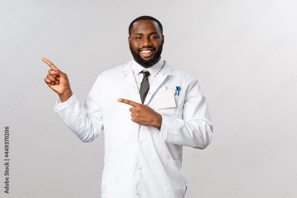 Covid19, healthcare and clinic concept. Portrait of handsome smiling ...