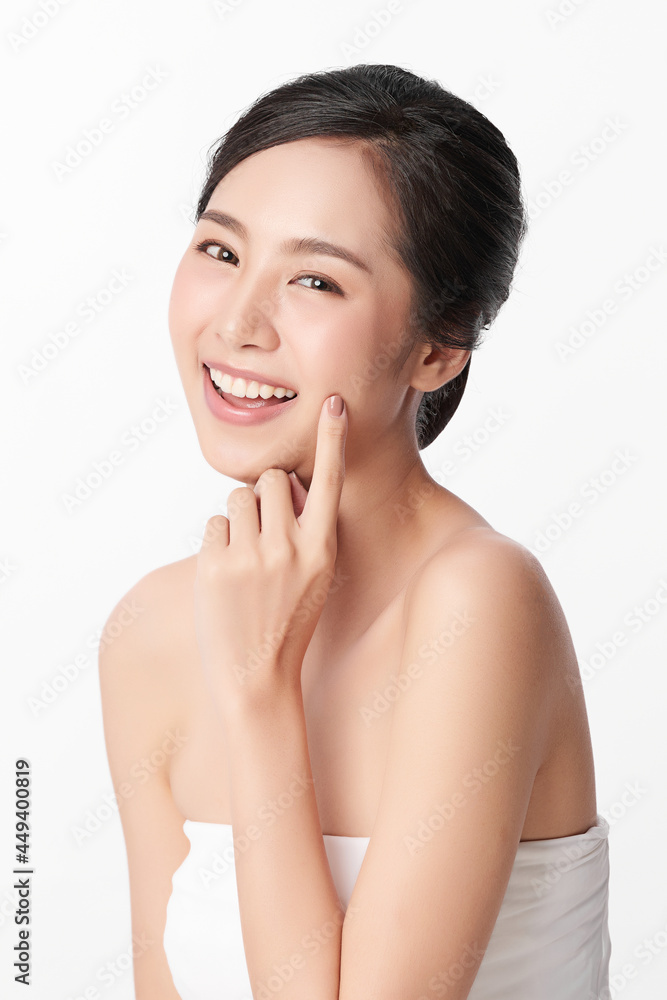 Beautiful young asian woman with clean fresh skin on white background ...
