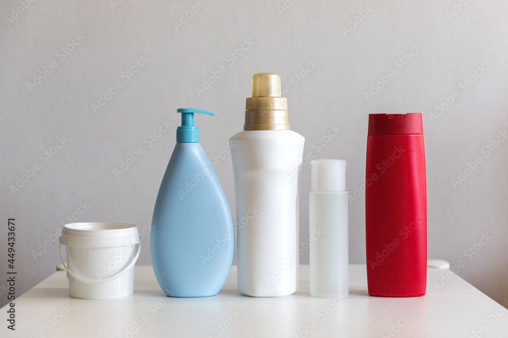 Different types of plastic package in everyday life. Bottles cleaned ...