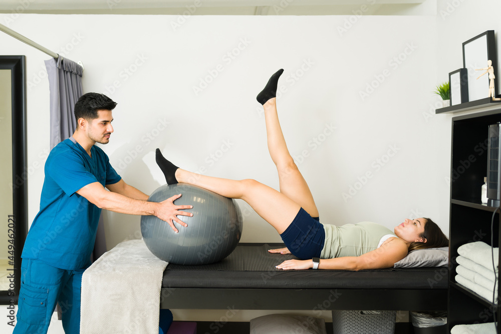 Side view of a patient doing rehabilitation exercises Stock Photo ...