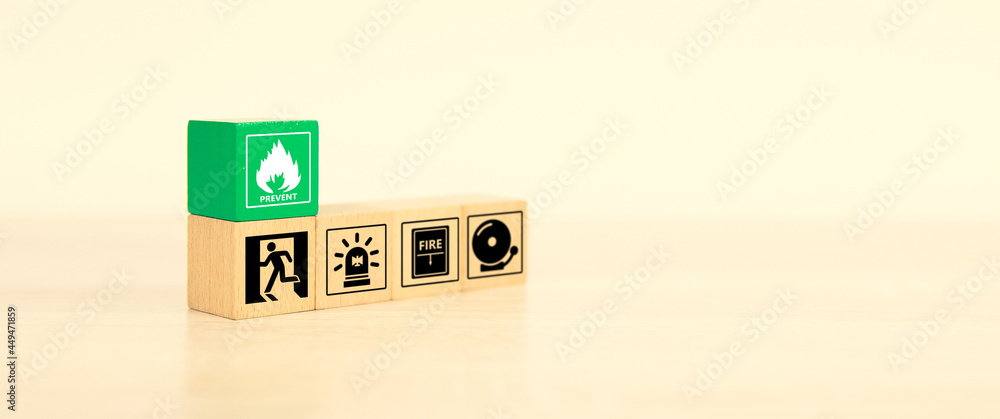 Fire prevention, Close-up cube wooden toy block stack with prevent icon ...