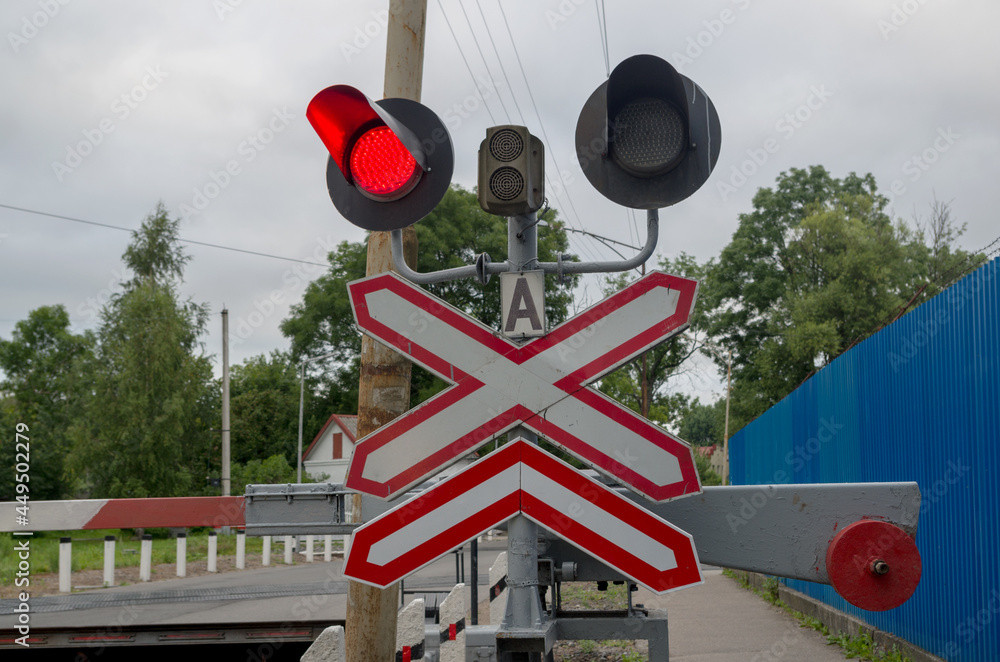 Warning road sign of railway crossing with double traffic light ...