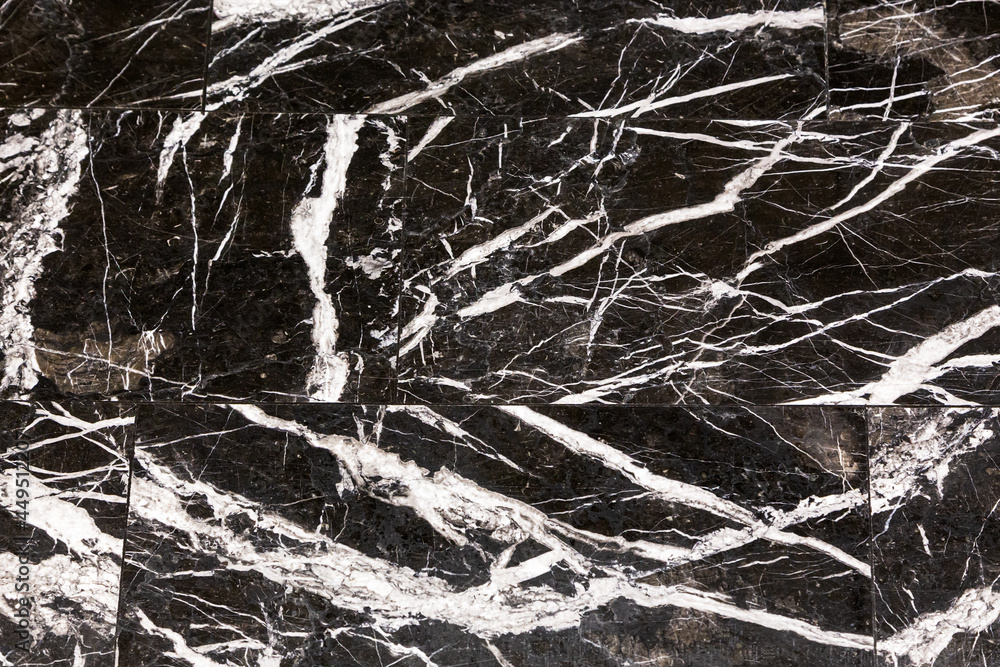 Black marble tile with white veins. Marble floor, stone pattern matched ...