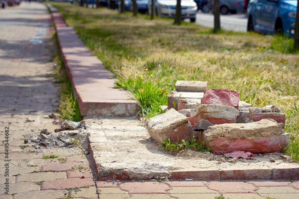 Road work, curb replacement, urban landscape edging. Broken sidewalk ...