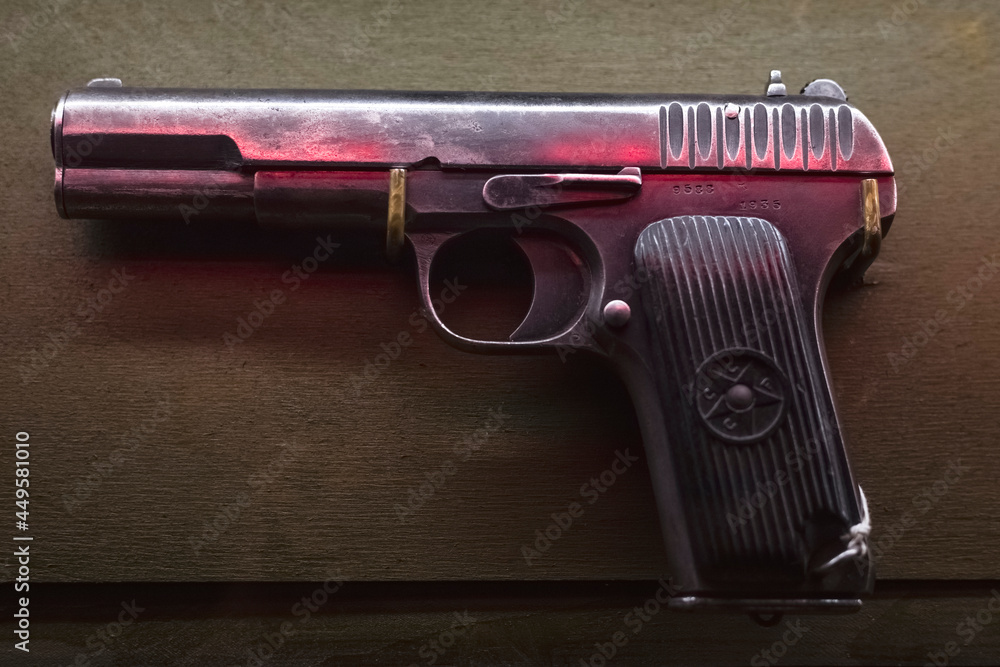 Tokarev system pistol, model 1933 (TT pistol). Wood background Stock ...