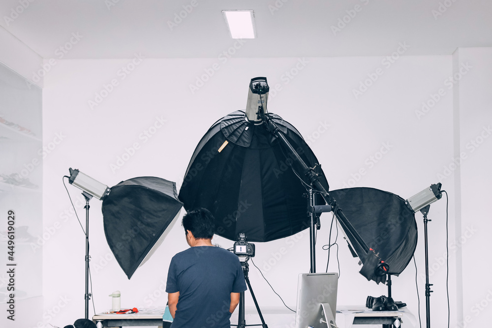Behind the scene of photoshoot with studio lighting set Stock Photo ...
