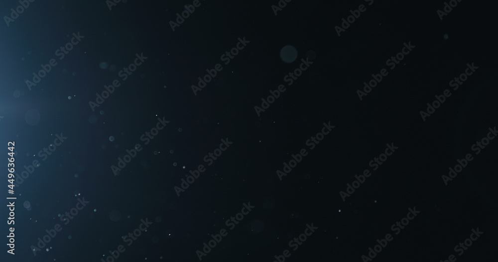 natural dust particles float in air on black background Stock Photo ...