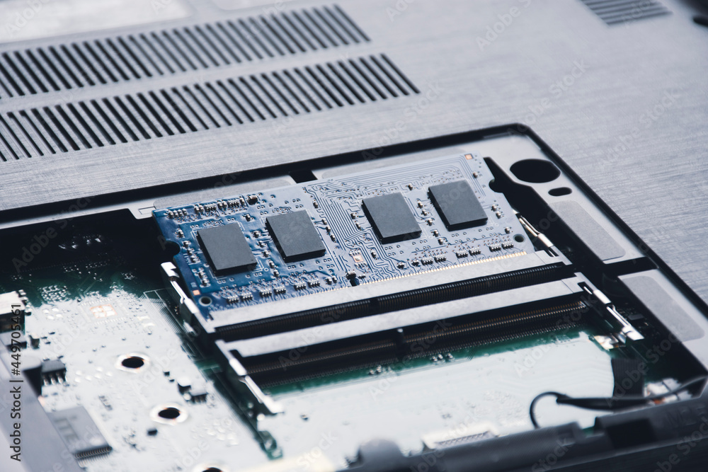 RAM (Random-access memory) in memory slot on the motherboard of laptop ...