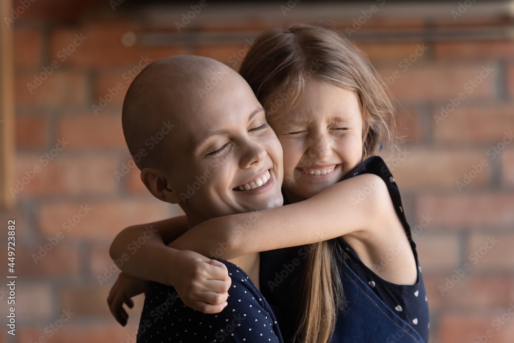 Happy daughter girl hugging mom with cancer, holding tight, smiling ...