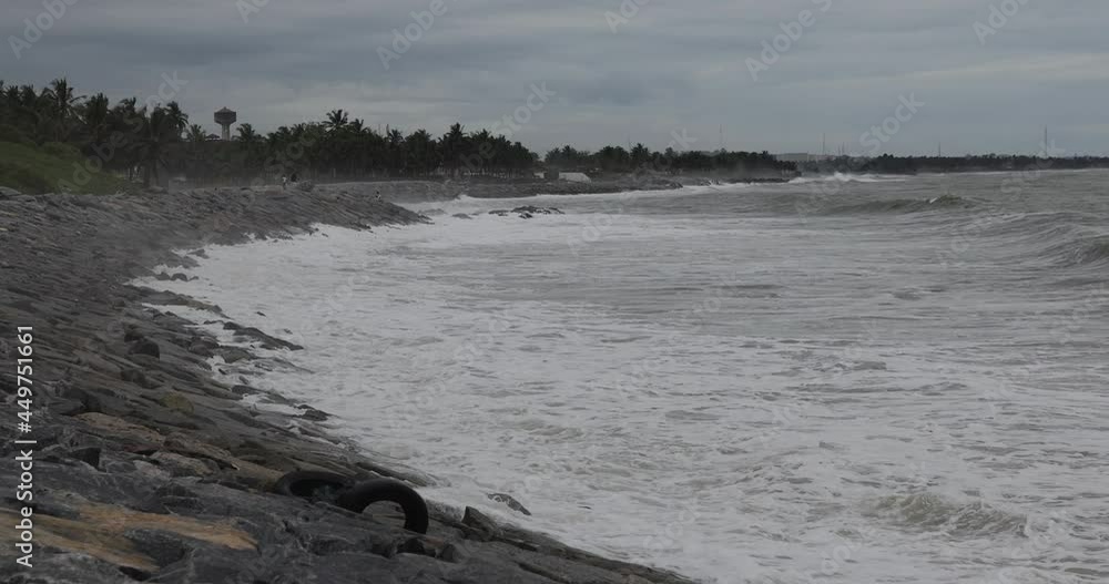 Ocean waves against rock sea wall Cape Coast Ghana. Ghana West Africa ...