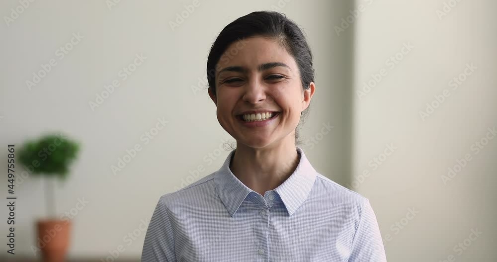Smiling Indian woman pose indoor look at camera, having toothy smile ...