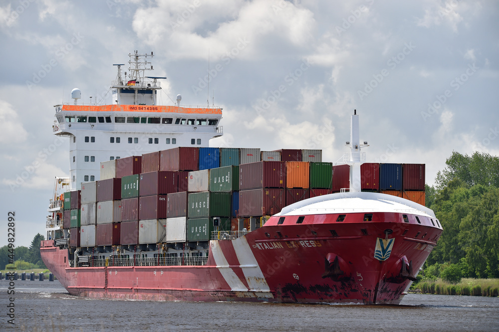 Containerschiff im Nord-Ostsee-Kanal Stock Photo | Adobe Stock