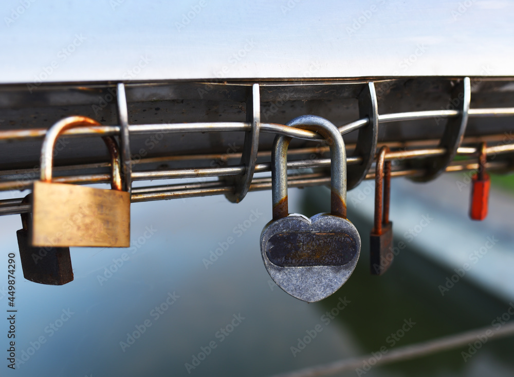 Padlock on Lovers Lock Bridge. Husband and wife during the wedding hung ...