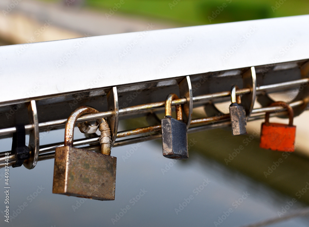 Padlock on Lovers Lock Bridge. Husband and wife during the wedding hung ...