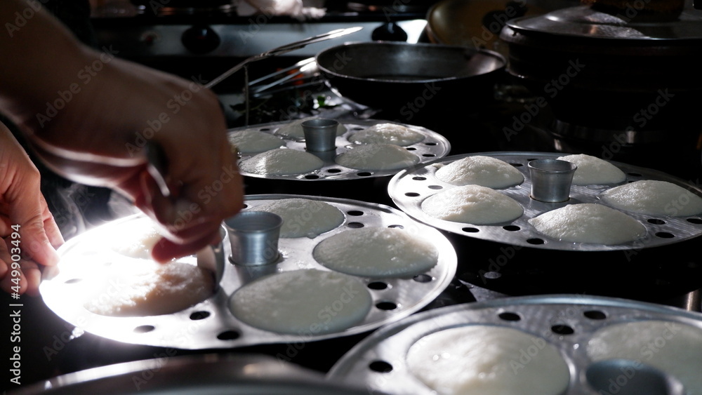 Fresh steamed Indian Idly (Idli / rice cake), traditional breakfast of ...