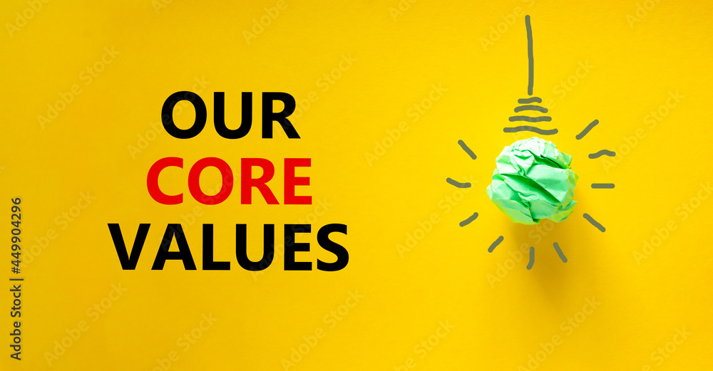 Our core values symbol. Green shining light bulb icon. Words 'Our core ...