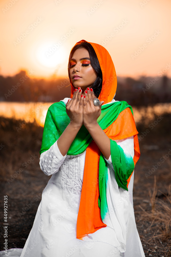 Asian young beautiful Islamic Muslim girl praying namaz with wearing ...