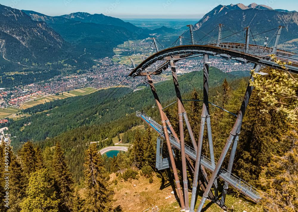 Beautiful alpine summer view with the Kreuzeckbahn and the Loisach ...