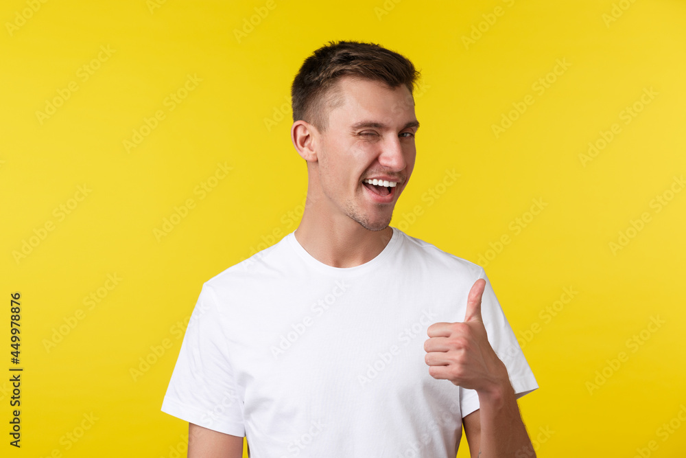Lifestyle, summer and people emotions concept. Cheeky handsome happy ...