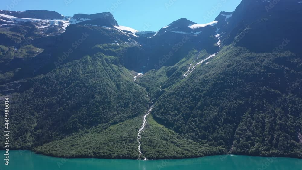 Melting glacier - Glacier river streaming from edge of icecap and down ...